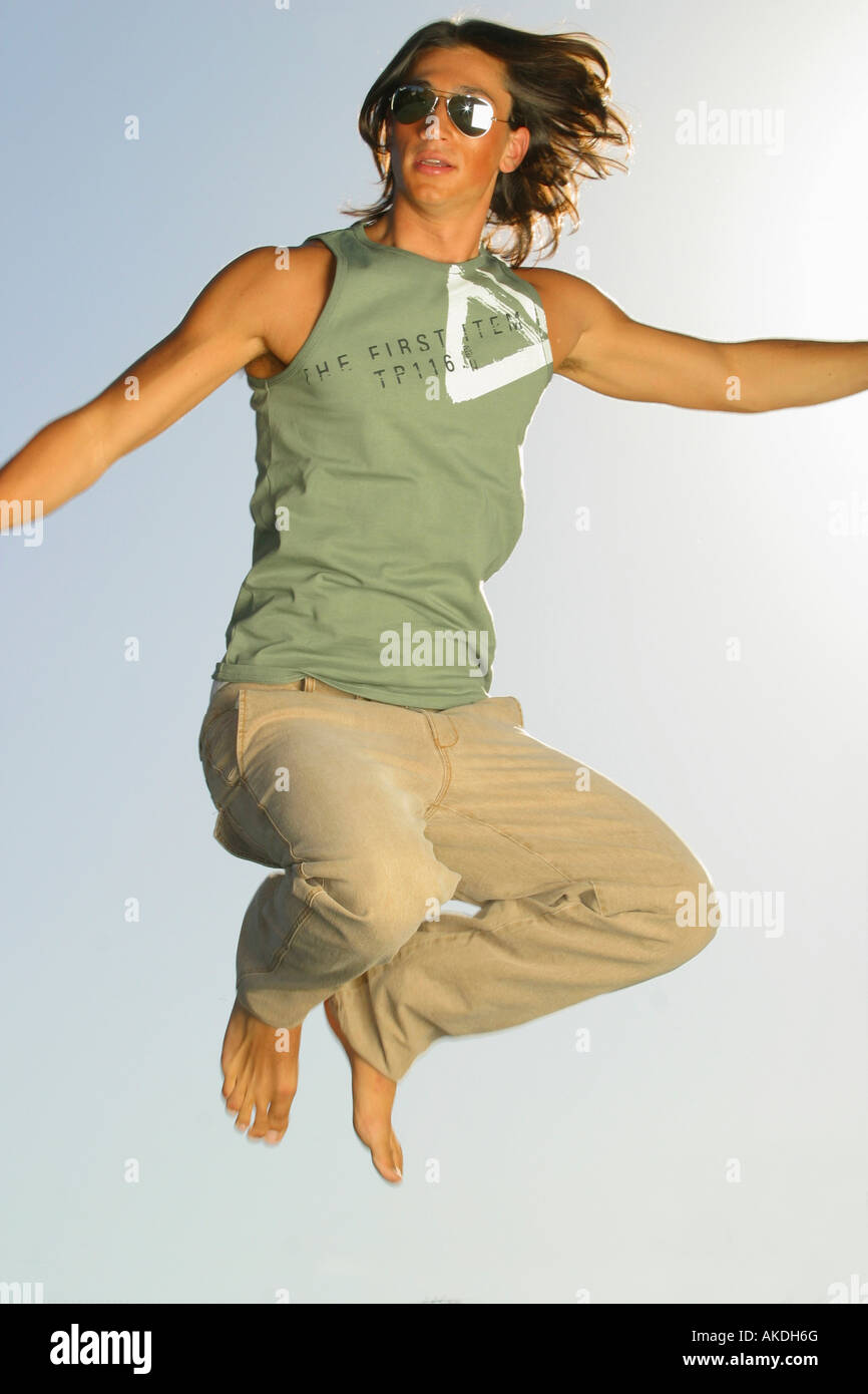 A person jumping very high into the air Stock Photo - Alamy