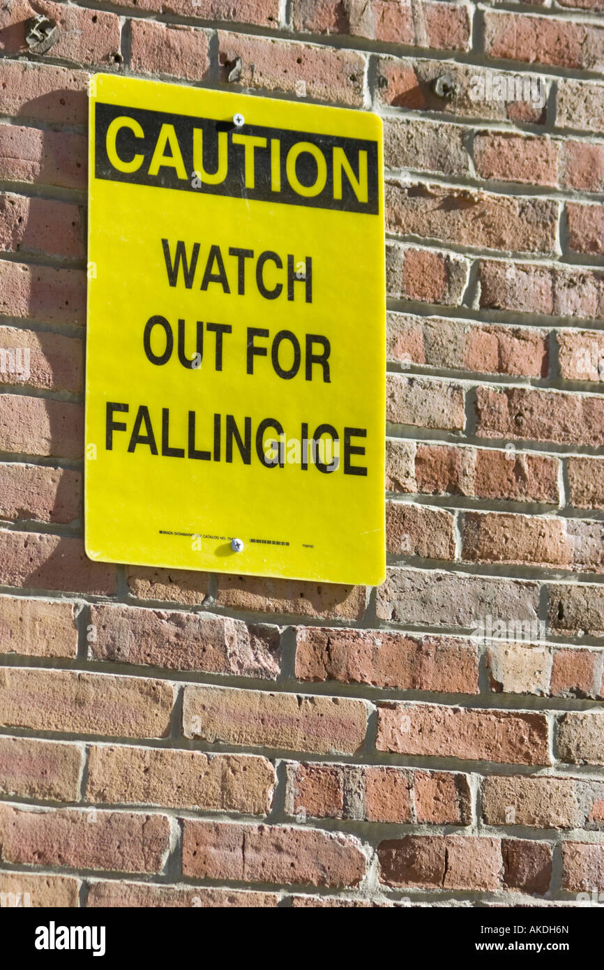 Caution falling ice sign hi-res stock photography and images - Alamy