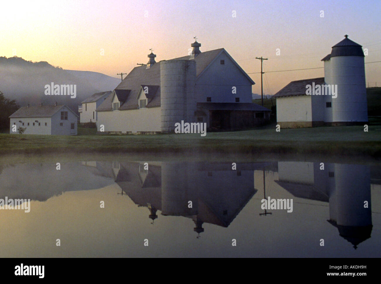 Farm reflections sunrise mist in Vermont Stock Photo - Alamy