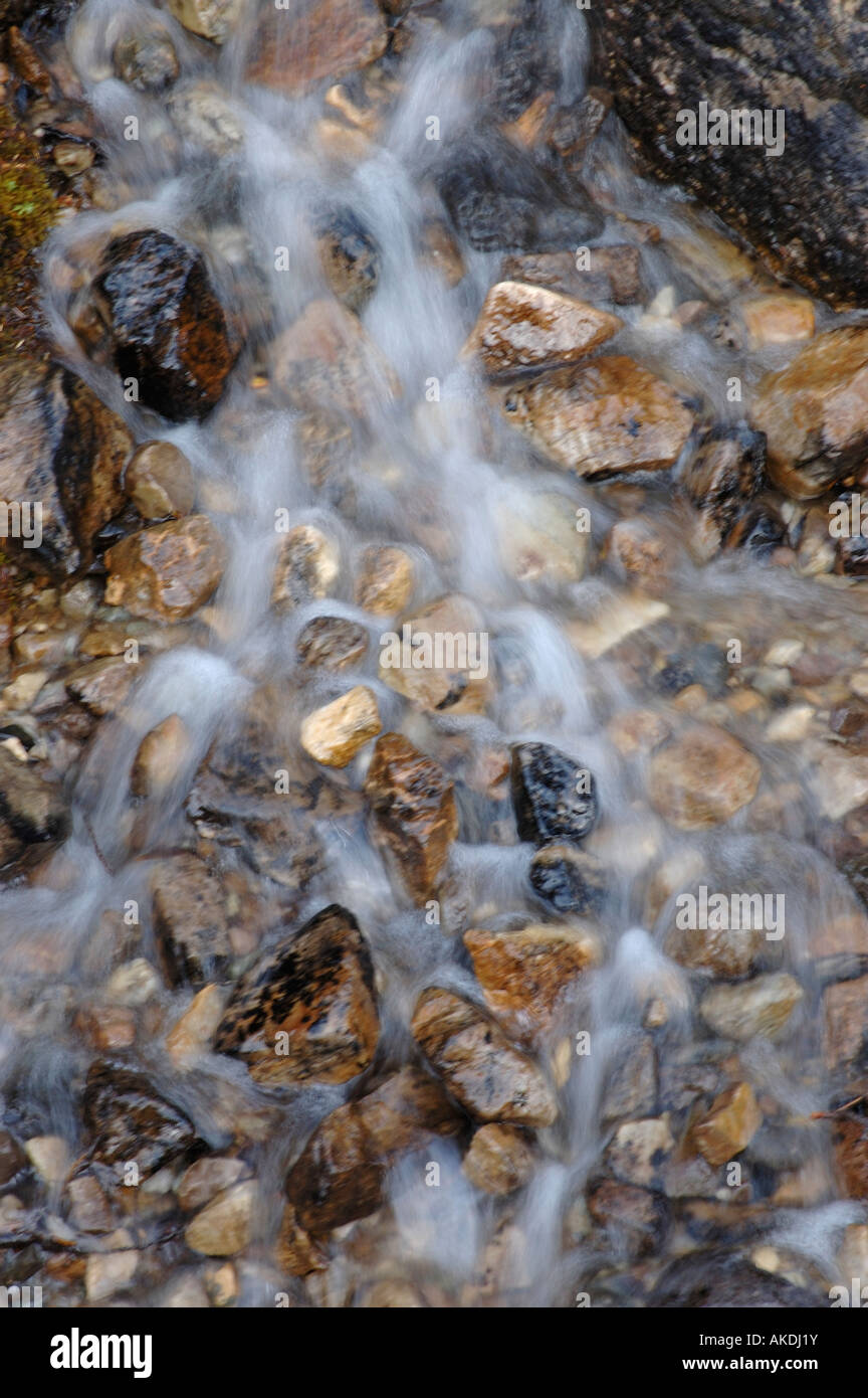 Water running over pebbles rocks hi-res stock photography and images ...