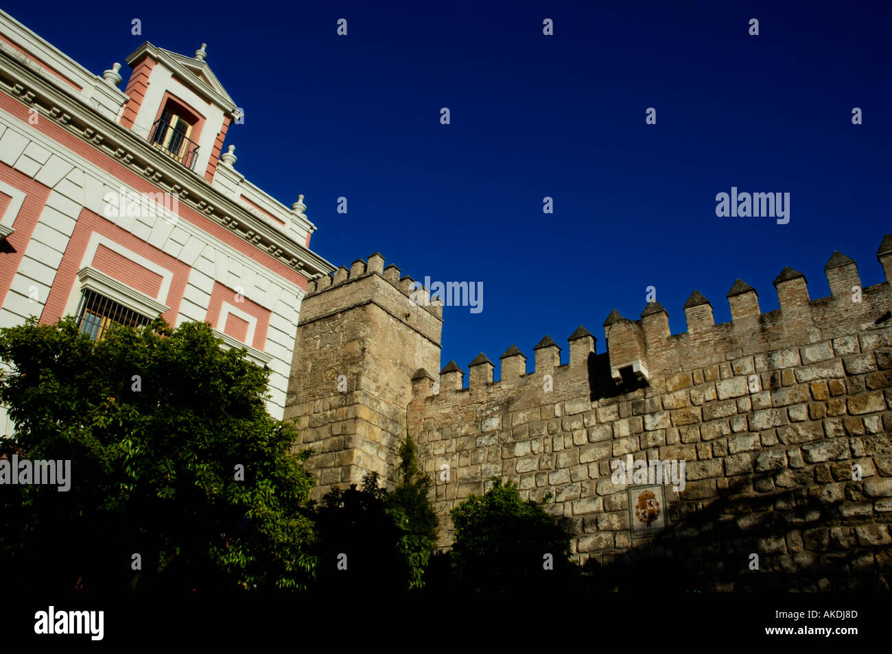 Spain Andalusia Seville The Alcazar Ramparts And A Building Facade ...