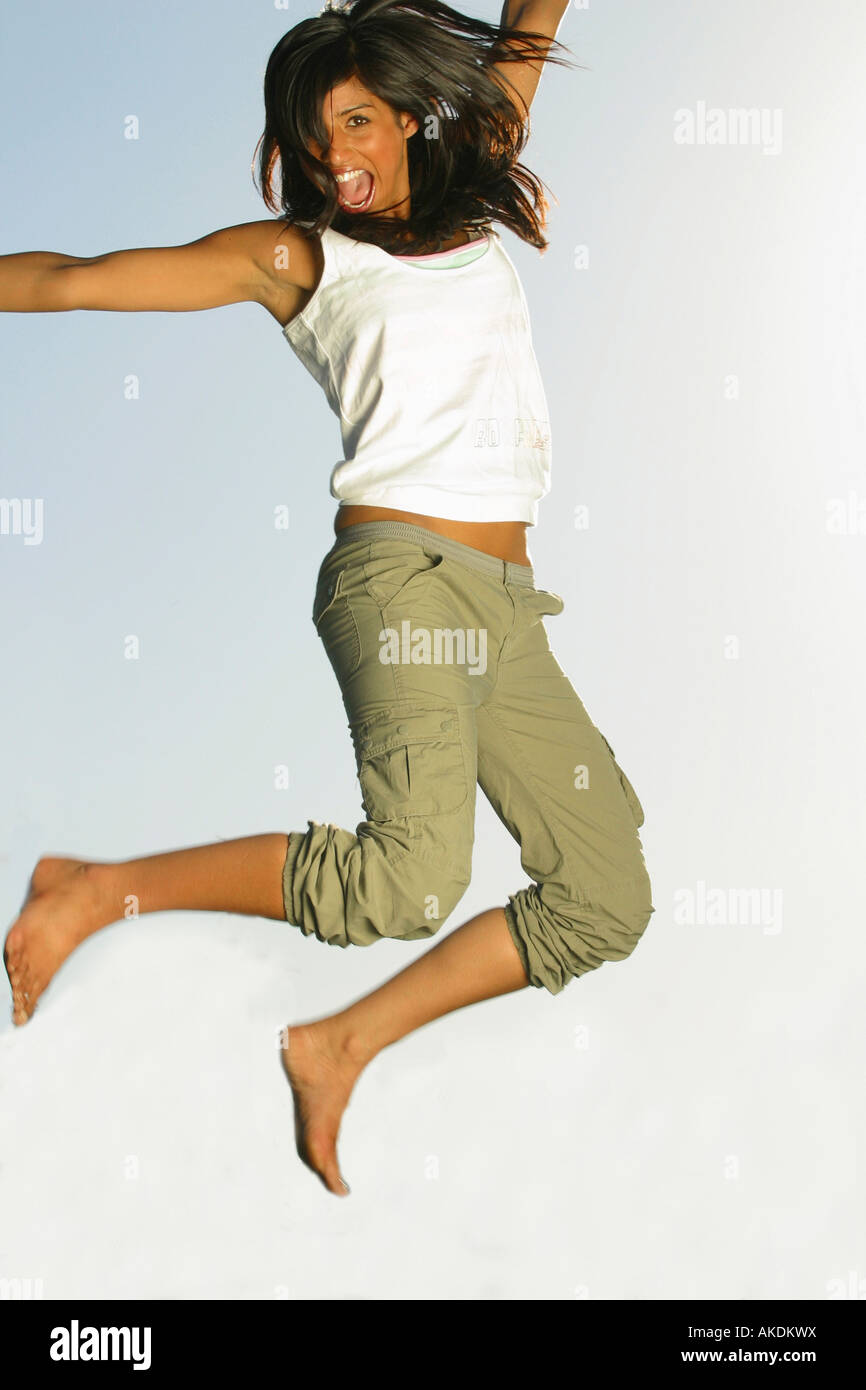 A person jumping very high into the air Stock Photo - Alamy