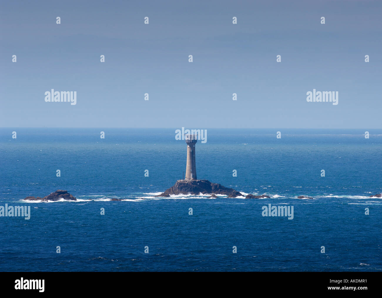 Longships Lighthouse with helipad situated off the coast of Land's End ...