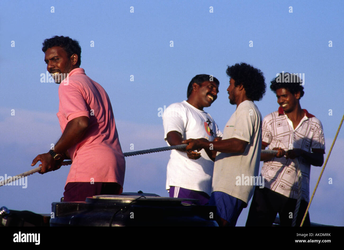 Maldivian boatcrew at work. Maldives Stock Photo - Alamy