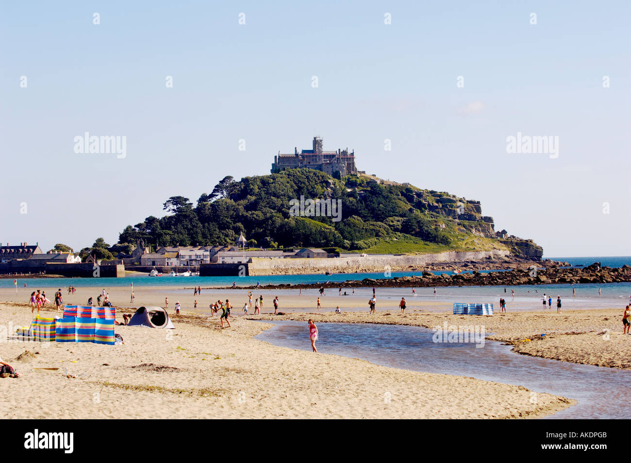 Tourists on Marazion Beach at low tide with St Michael's Mount in the ...
