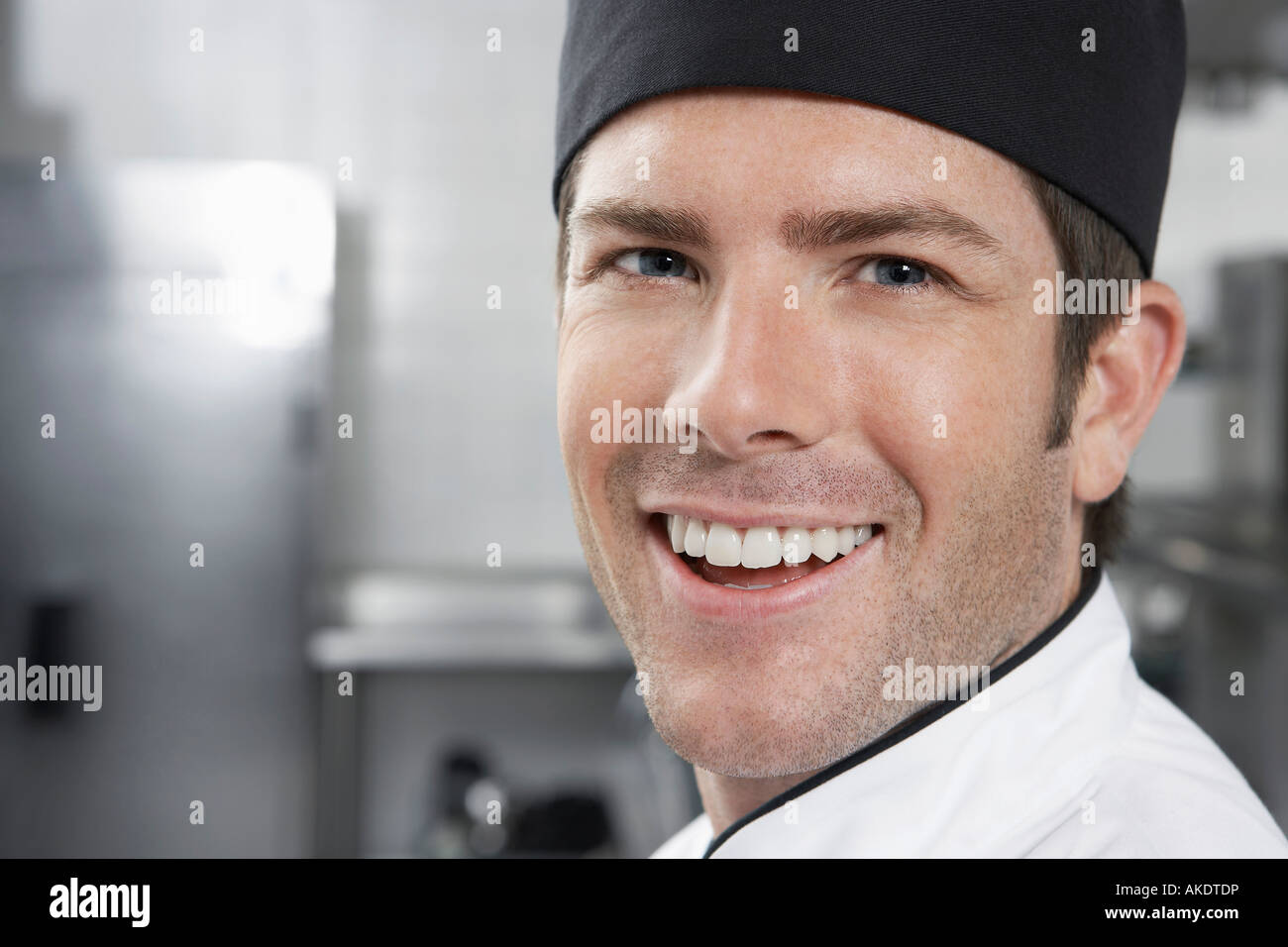 Male chef smiling, close-up, portrait Stock Photo - Alamy