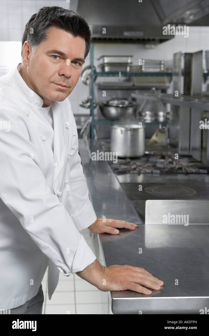 Male chef in kitchen, portrait Stock Photo - Alamy