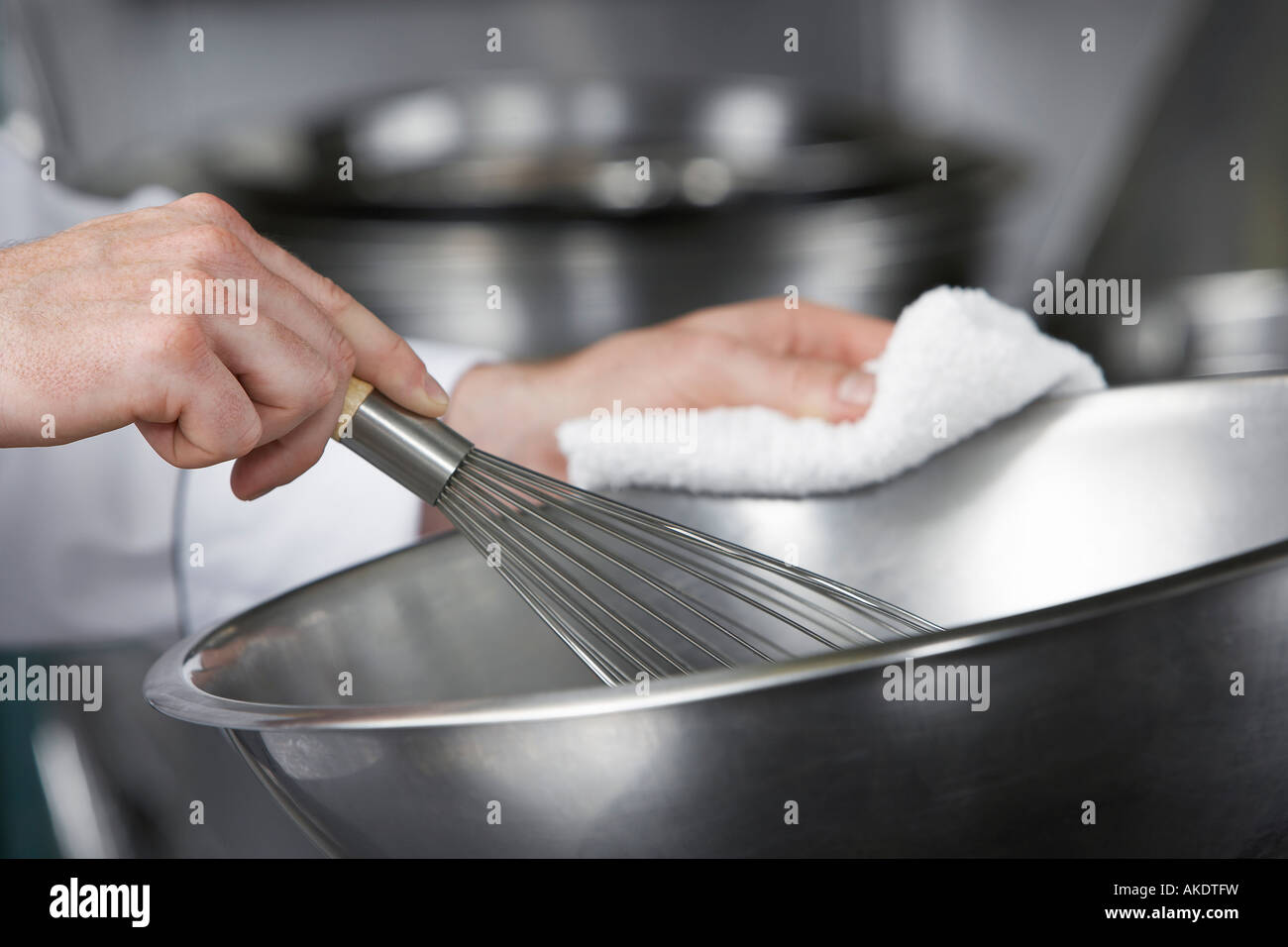 Hand whisking ingredients in hi-res stock photography and images - Alamy