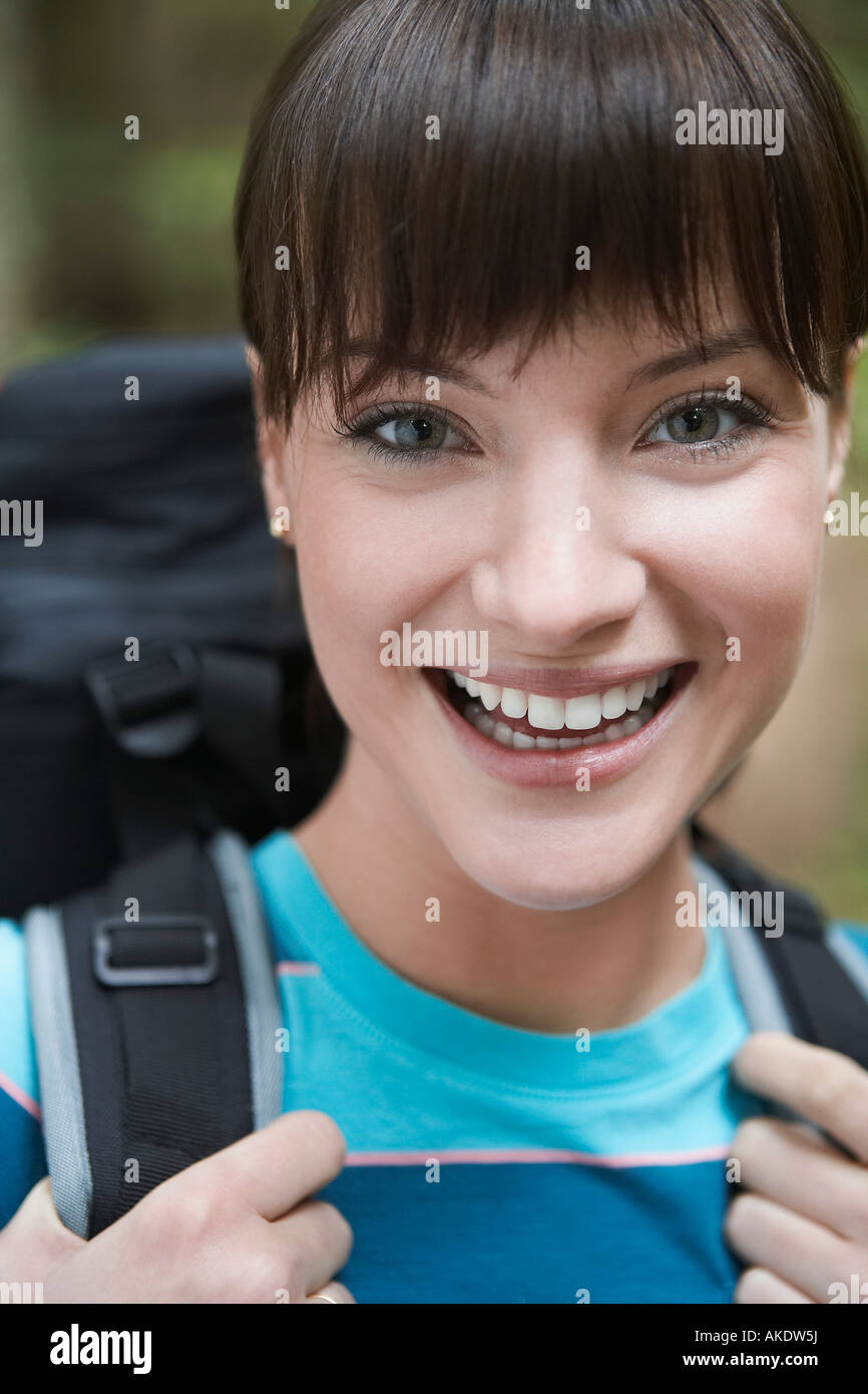 Woman wearing backpack, close-up, portrait Stock Photo - Alamy
