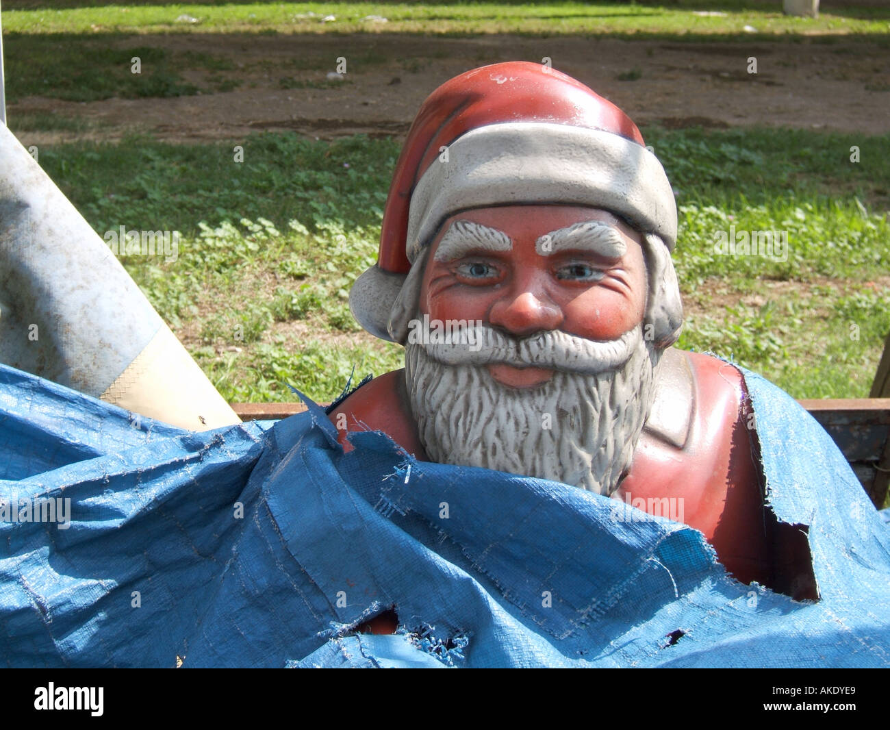 happy father christmas model covered with blue tarpaulin Stock Photo ...