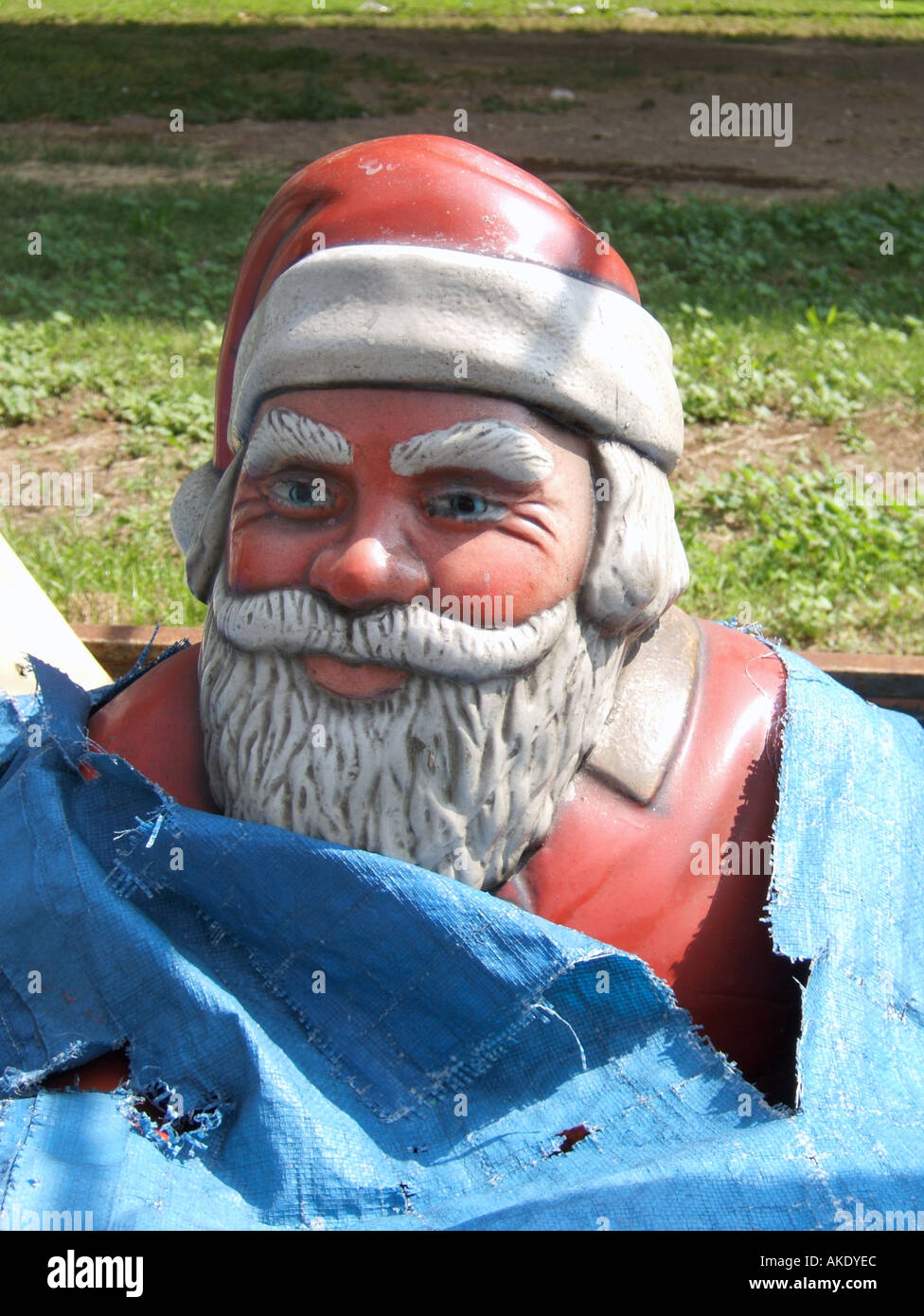 happy father christmas model covered with blue tarpaulin Stock Photo ...