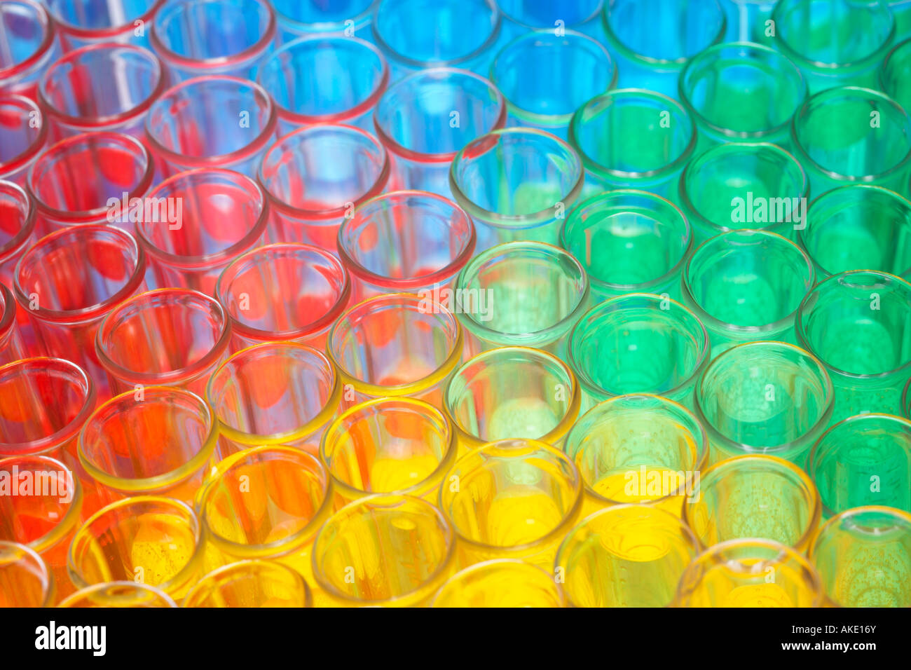 Multi-coloured chemical samples in glasses Stock Photo - Alamy