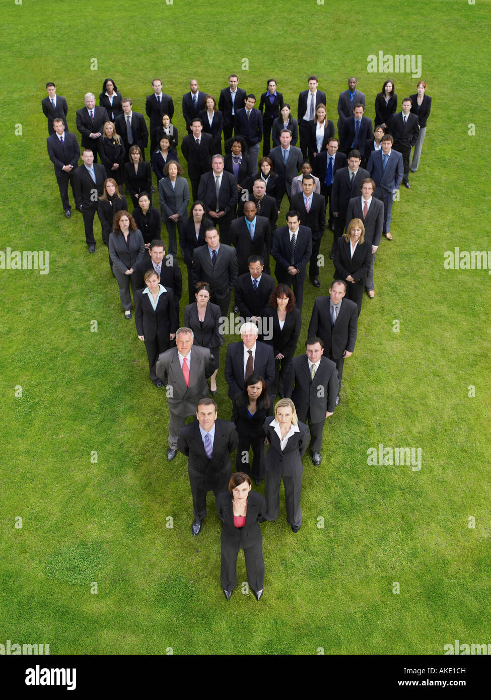 Business people standing in triangle hi-res stock photography and ...