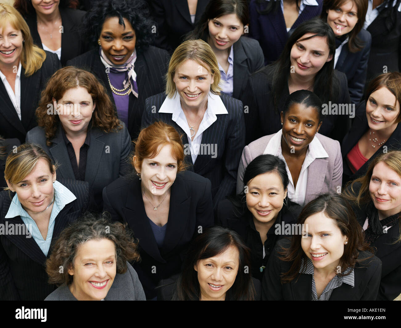 Group of business women looking up, portrait, elevated view, close up ...