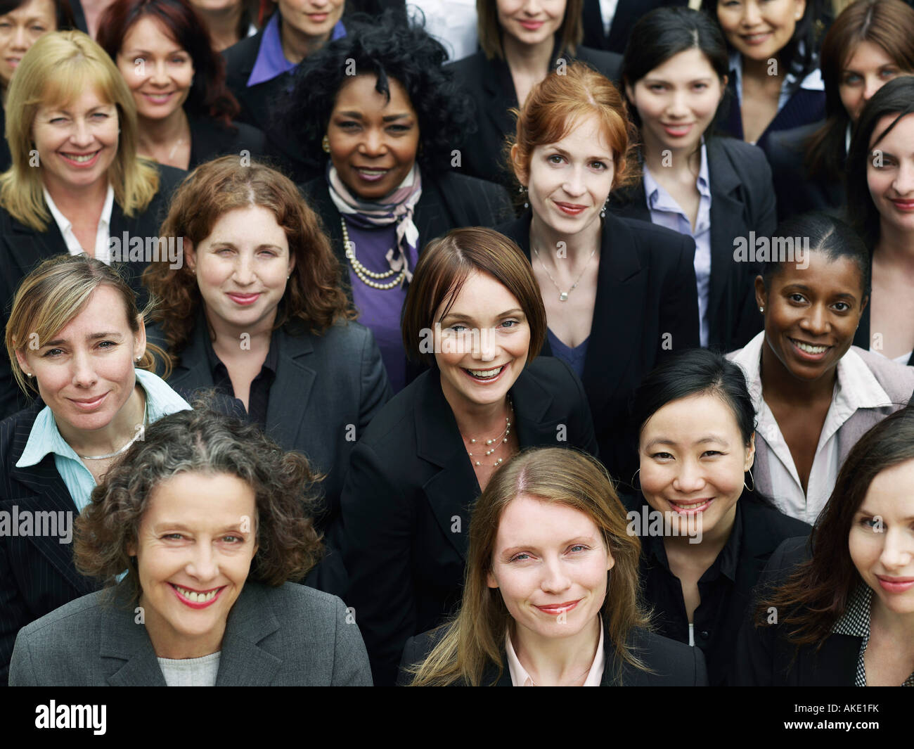 Group of business women looking up, portrait, elevated view, close up ...