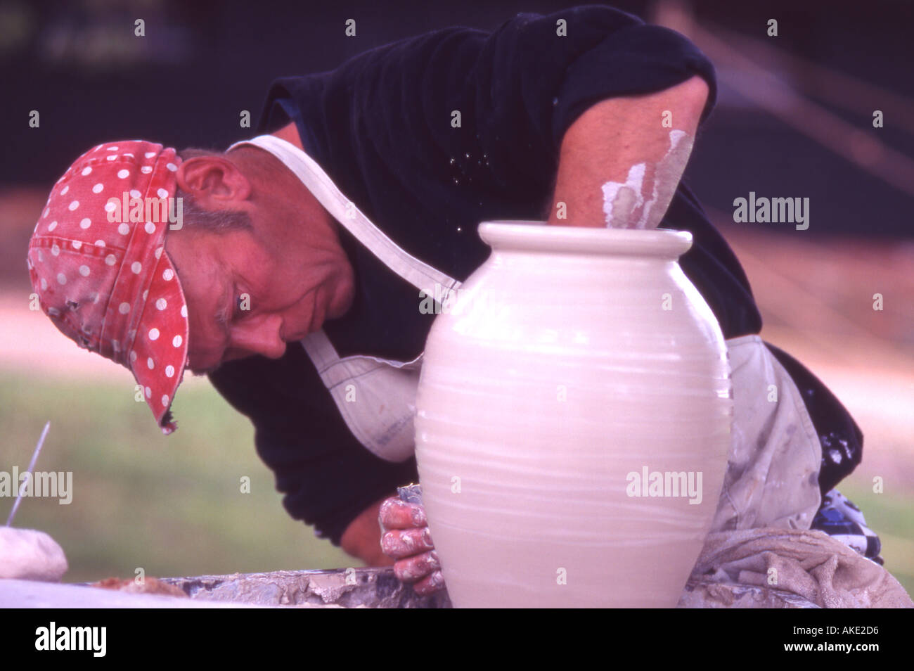 Making pots on traditional wheel hi-res stock photography and images ...
