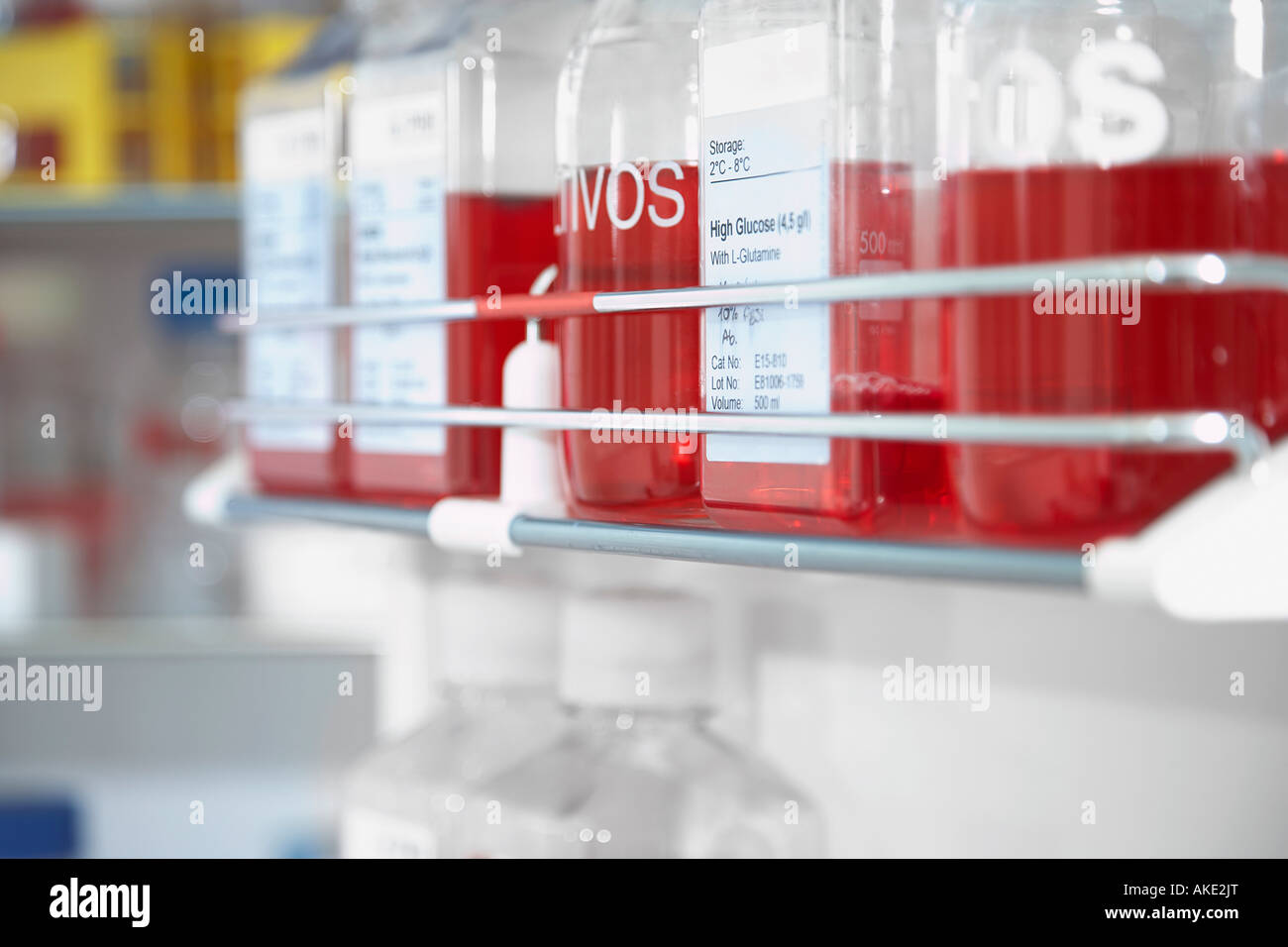 Red chemicals in laboratory Stock Photo - Alamy