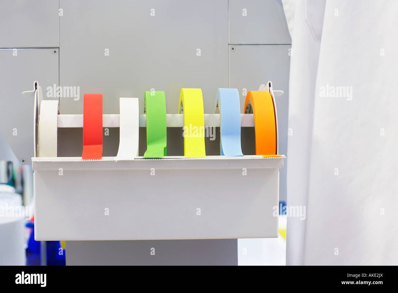 Rolls of multi-coloured labelling tape in laboratory Stock Photo - Alamy