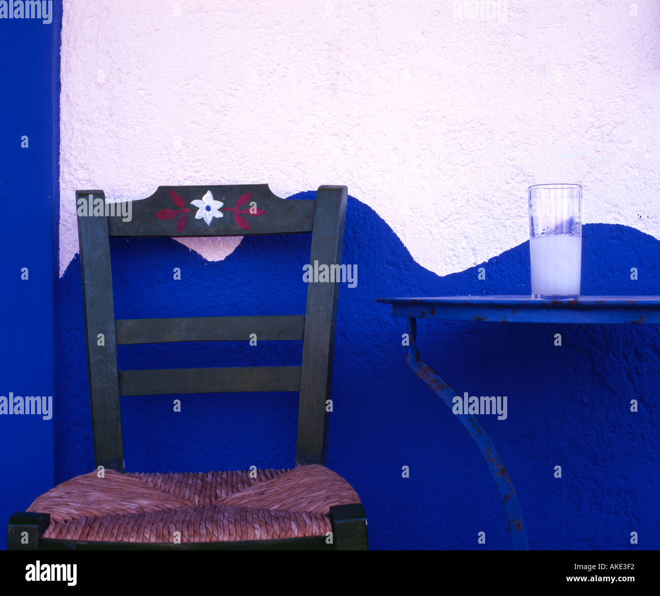 A glass of ouzo on a taverna table South Crete Greece Stock Photo - Alamy