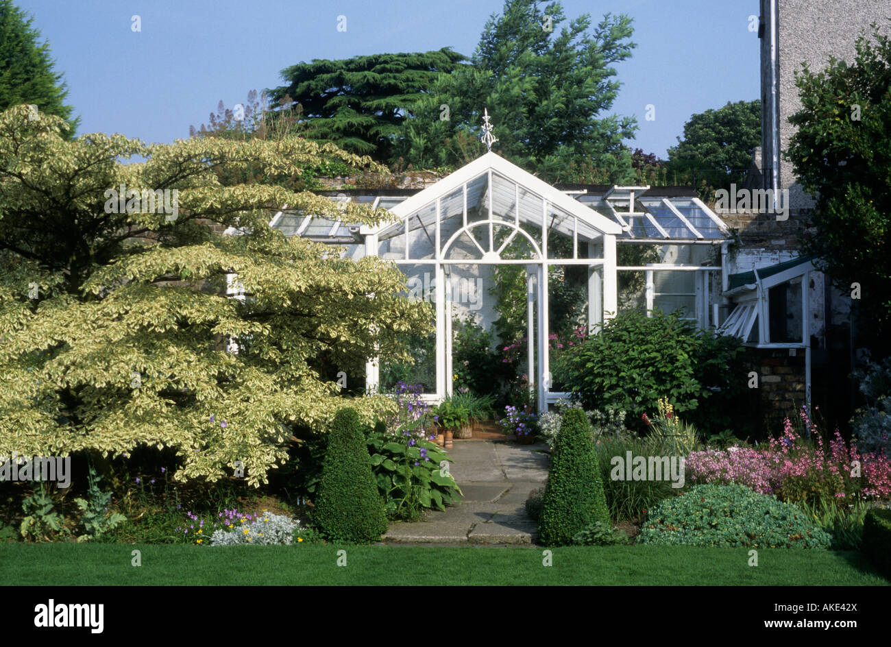 The Dillon Garden Dublin Ireland traditional wooden glasshouse with ...
