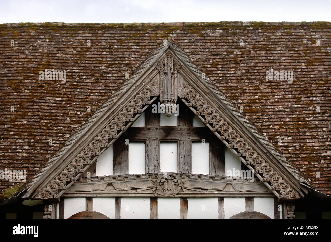 ORNATELY CARVED FASCIA ON TIMBER FRAMED ROOF GABLES AT RUDHALL MANOR ...