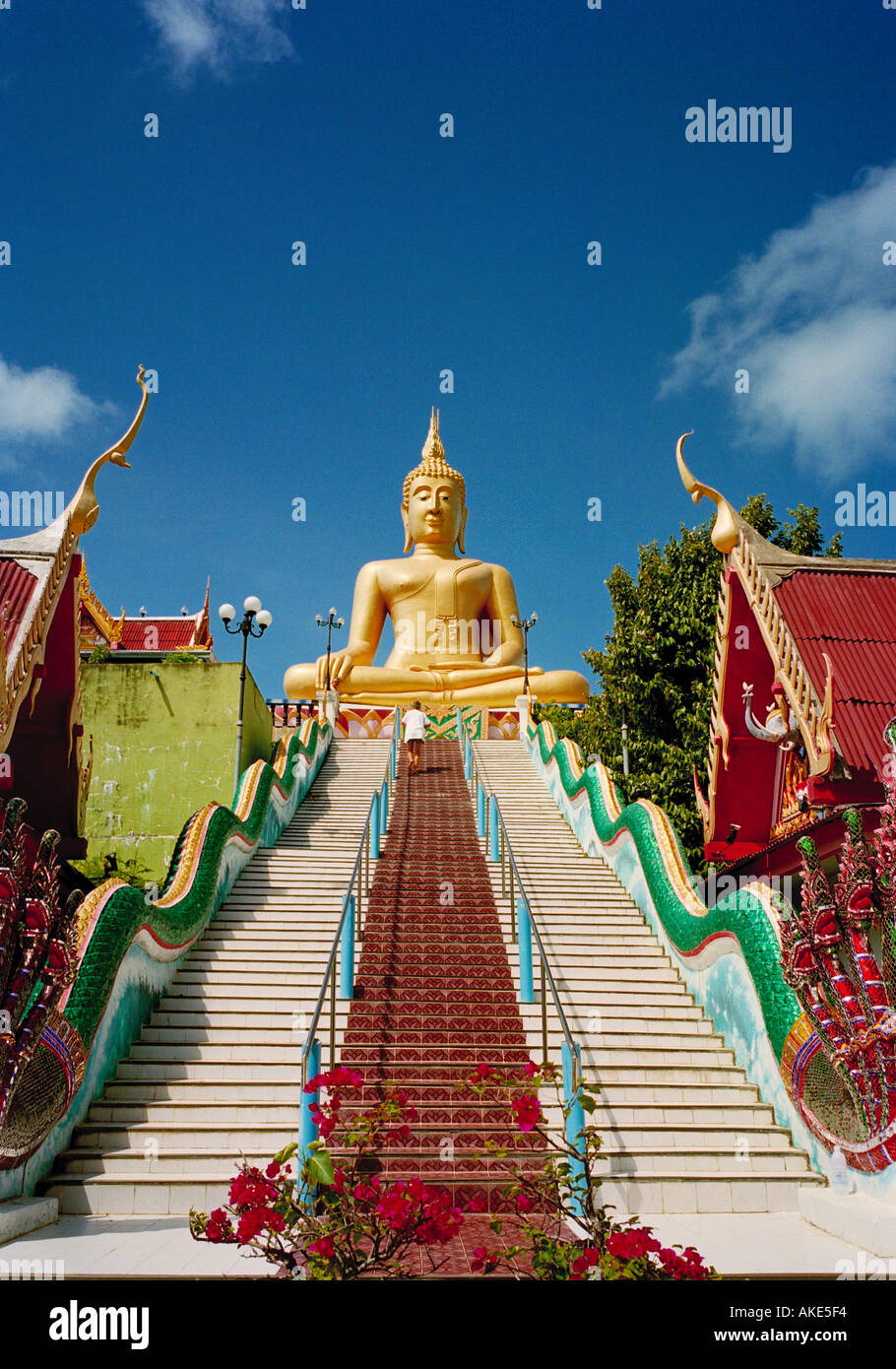 Naga (serpent) staircase leading to the giant golden statue of Big ...