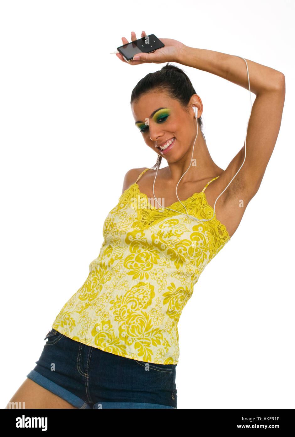 girl with MP3 player dancing Stock Photo - Alamy