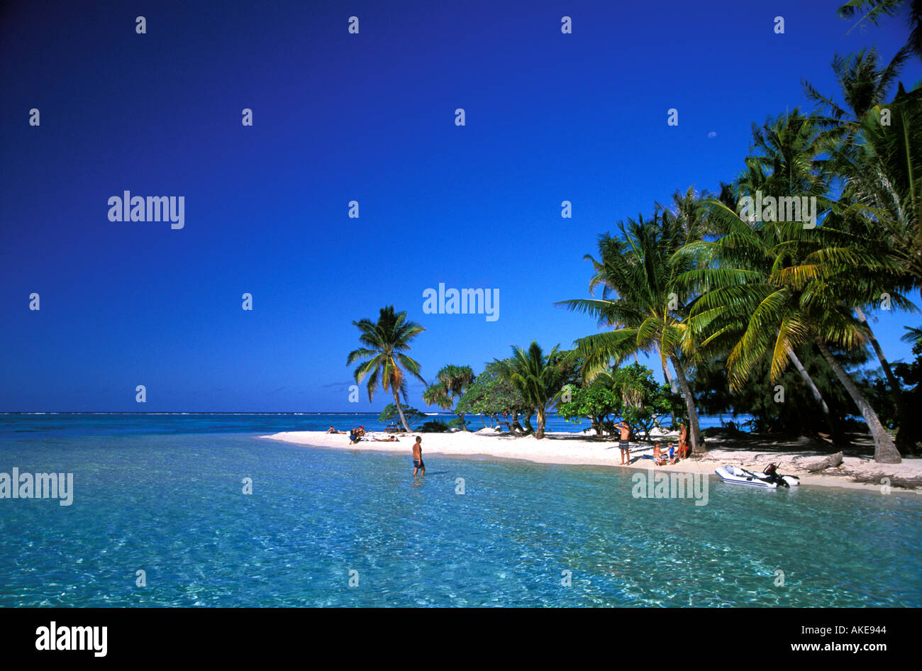 Only a few sunbathers on empty small island beach South Pacific Stock ...