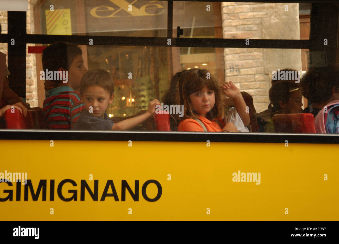 Children on a school bus in San Gimignano Tuscany Italy Stock Photo - Alamy
