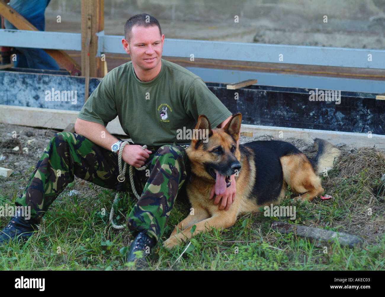British Army Dog Handler and His Alsatian Dog Stock Photo - Alamy