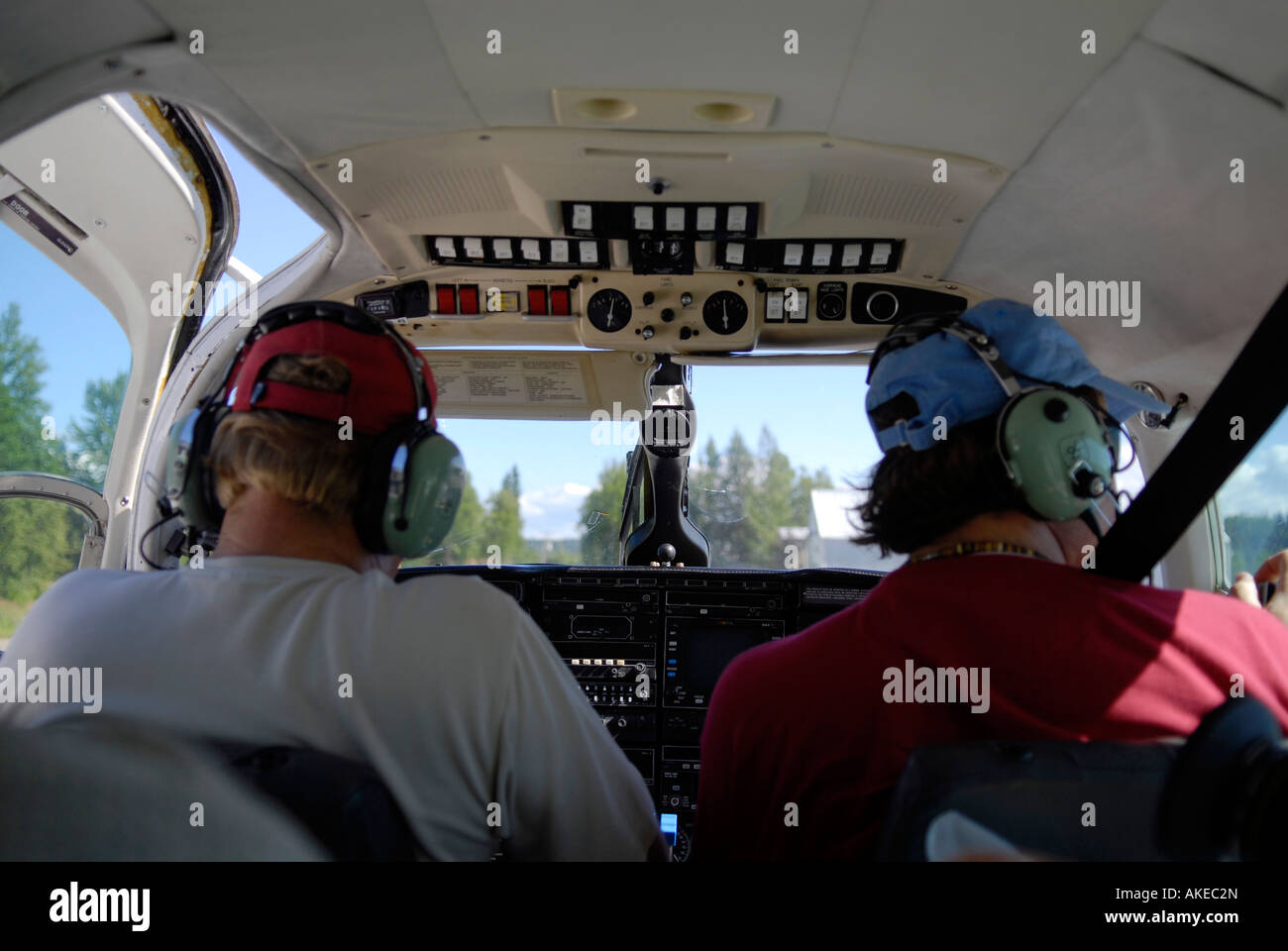 Passengers on twin engine sightseeing airplane plane in Town of ...