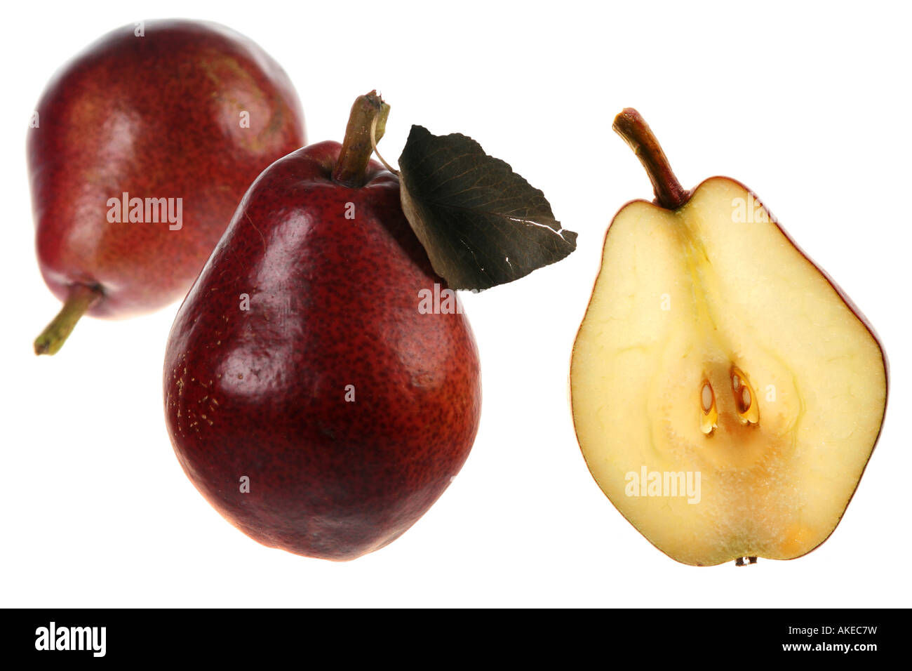 Closeup slice pear with seed on white background Stock Photo - Alamy