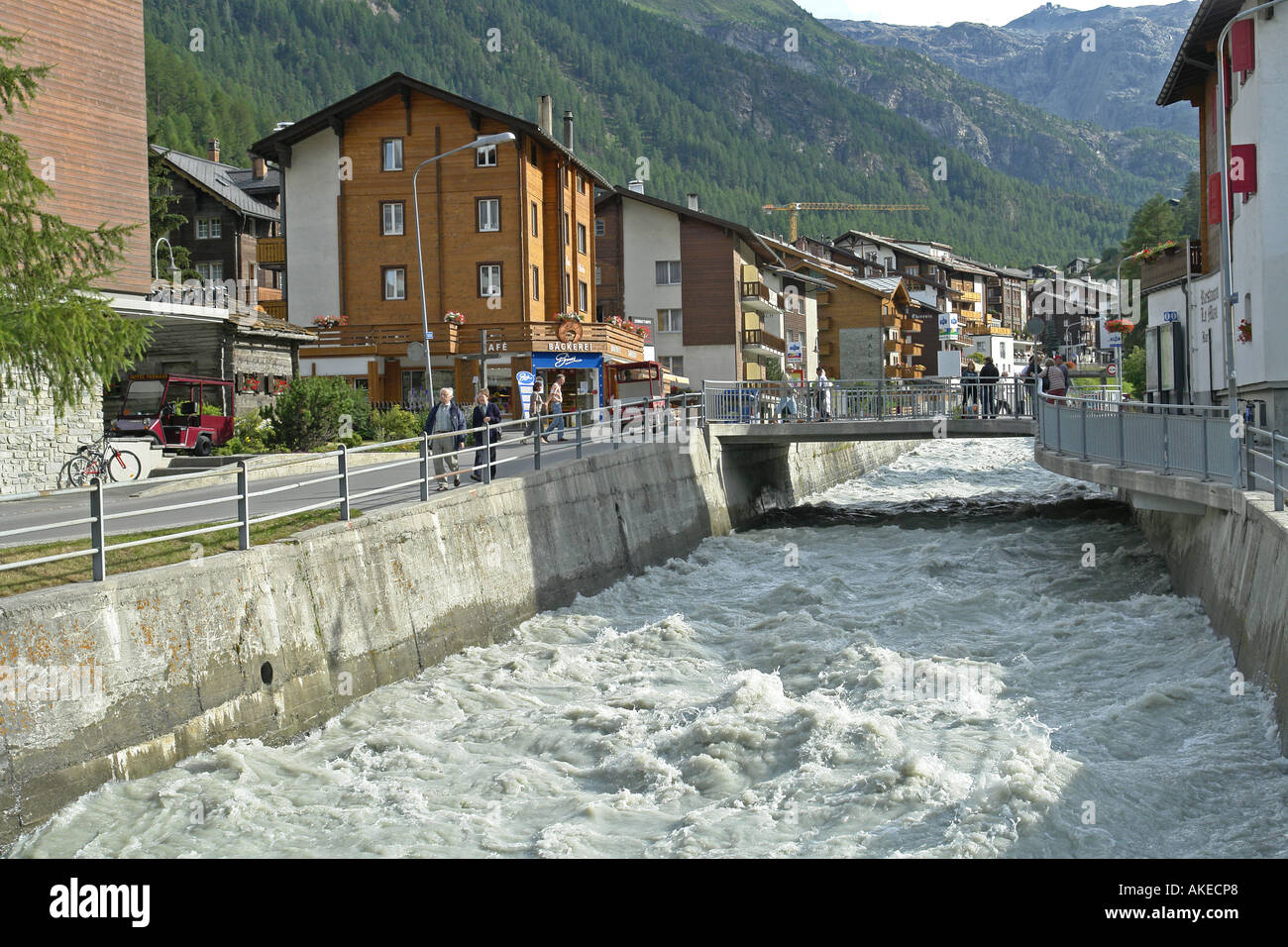 River Mattervispa rushing through Zermatt on a sunny summer day Stock ... River Mattervispa rushing through Zermatt on a sunny summer day Stock ...