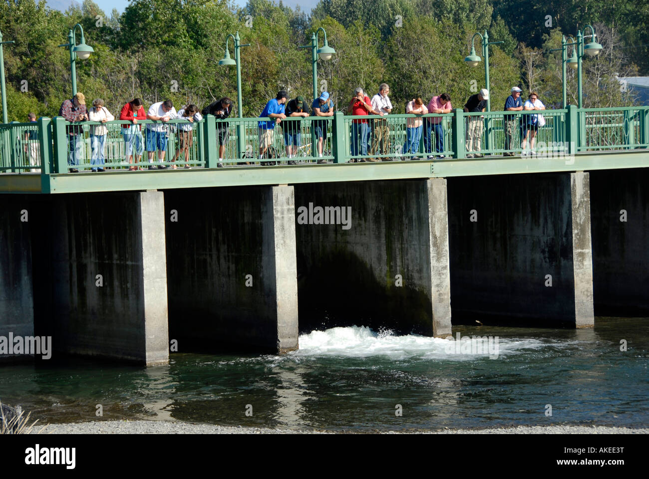 Pedestrians visitors tourists on Bridge Overlooking Ship Creek ...