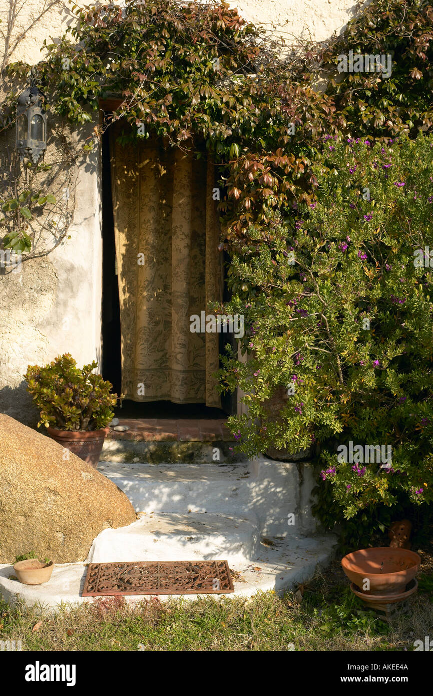 doorway into old farm building with decorative material whitewash and ...