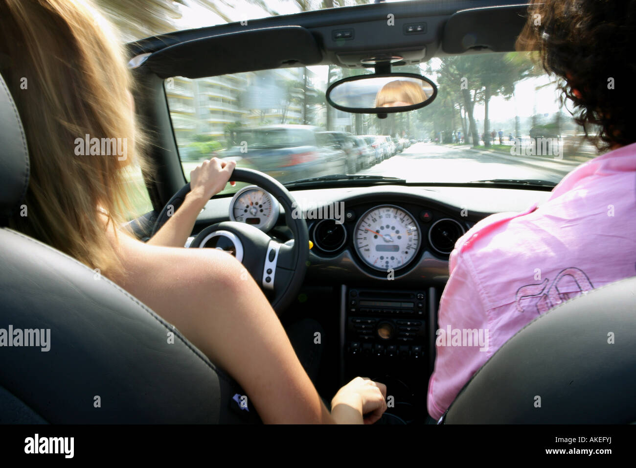 young couple driving a convertible car Stock Photo - Alamy