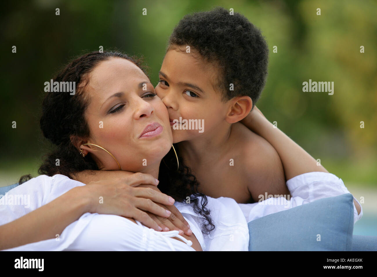 young woman with child Stock Photo - Alamy