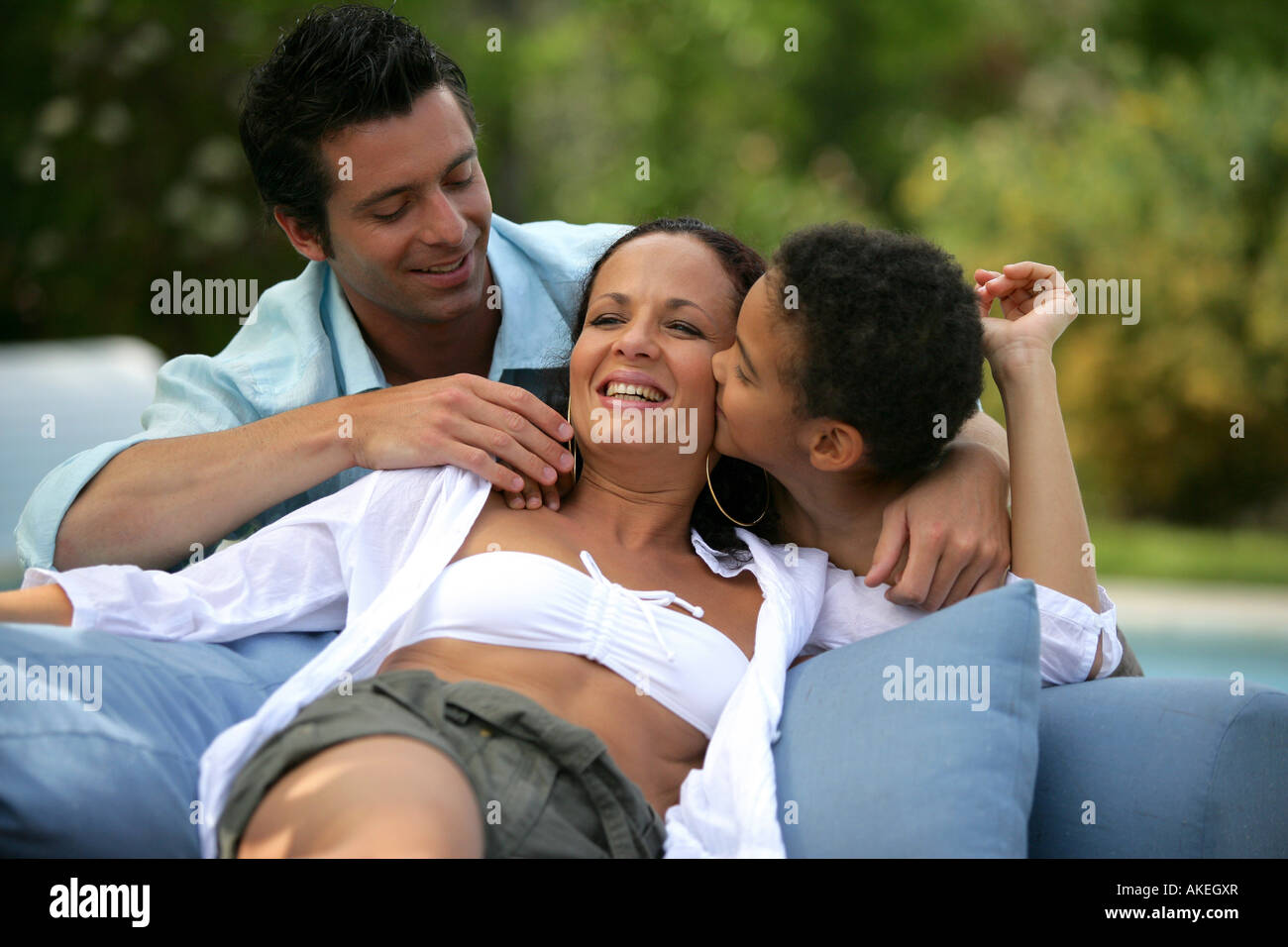 young couple with child Stock Photo - Alamy