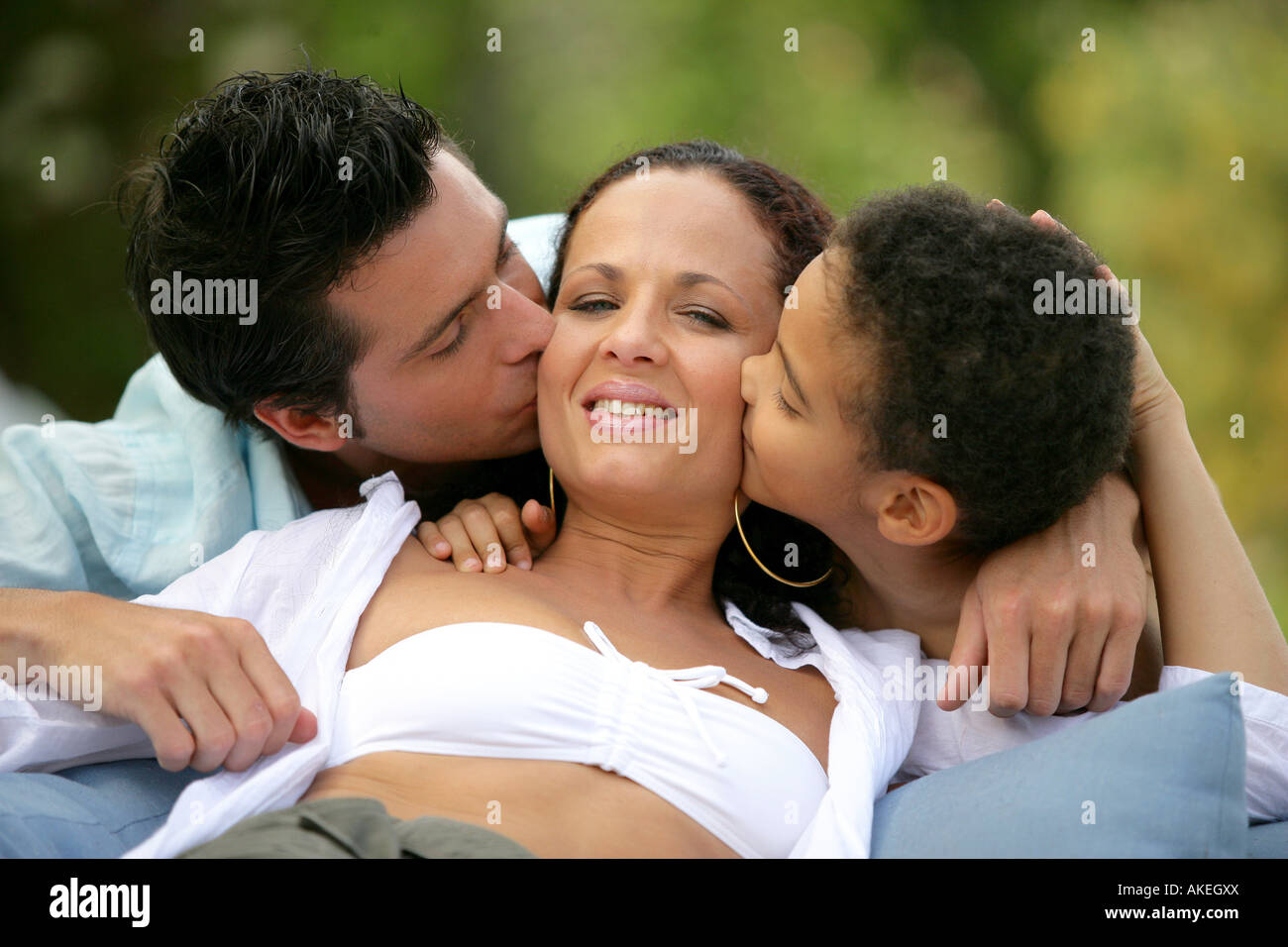 young couple with child Stock Photo - Alamy