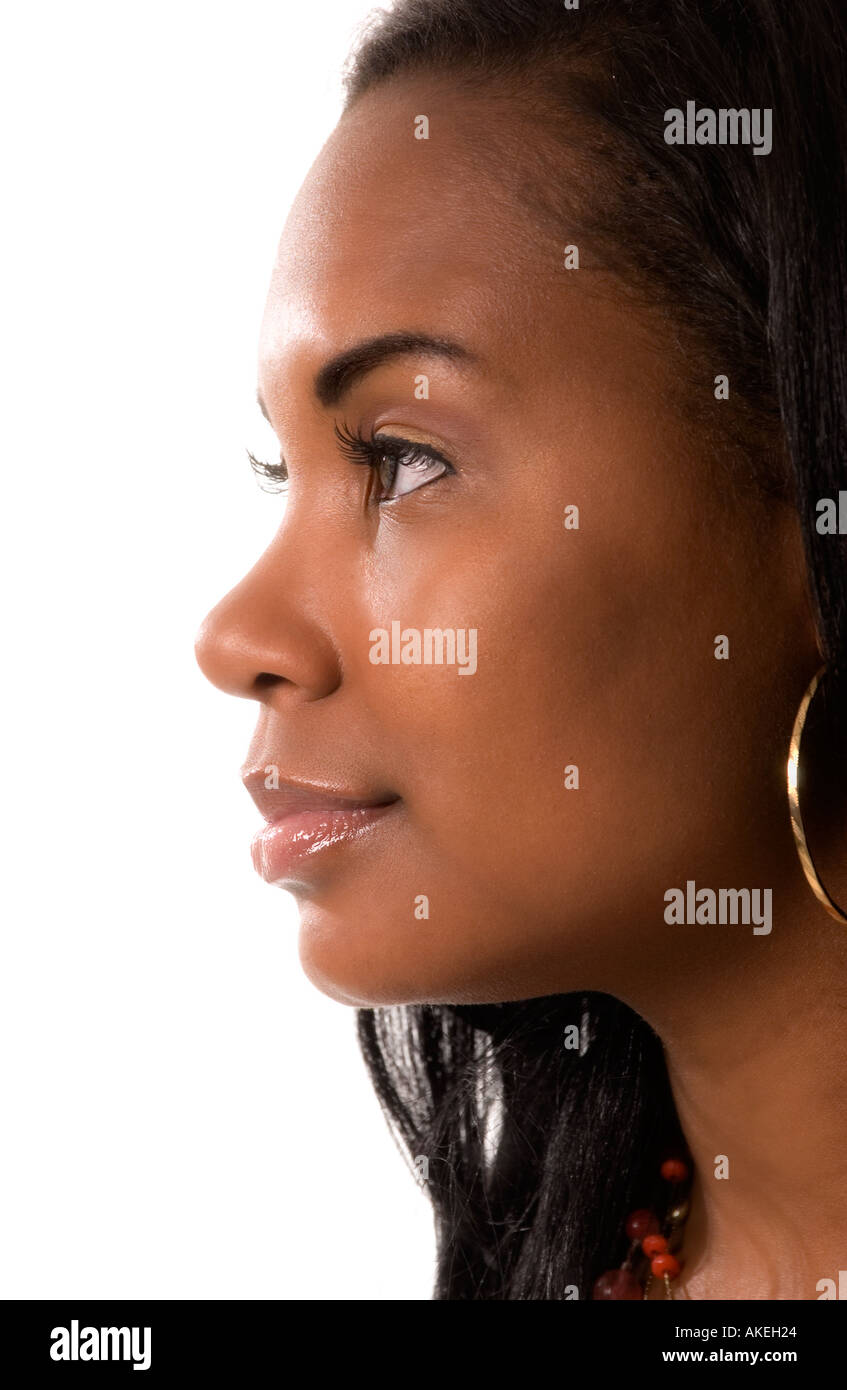 Side profile portrait of a young Black woman in the USA, showing ...