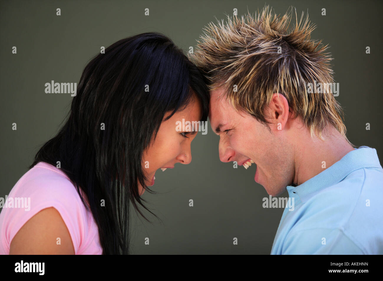 young couple shouting Stock Photo - Alamy