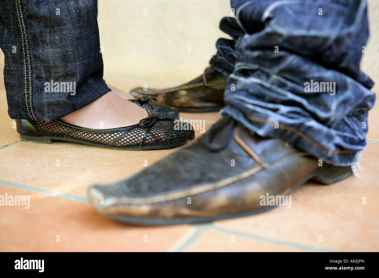 young couple's feet Stock Photo - Alamy