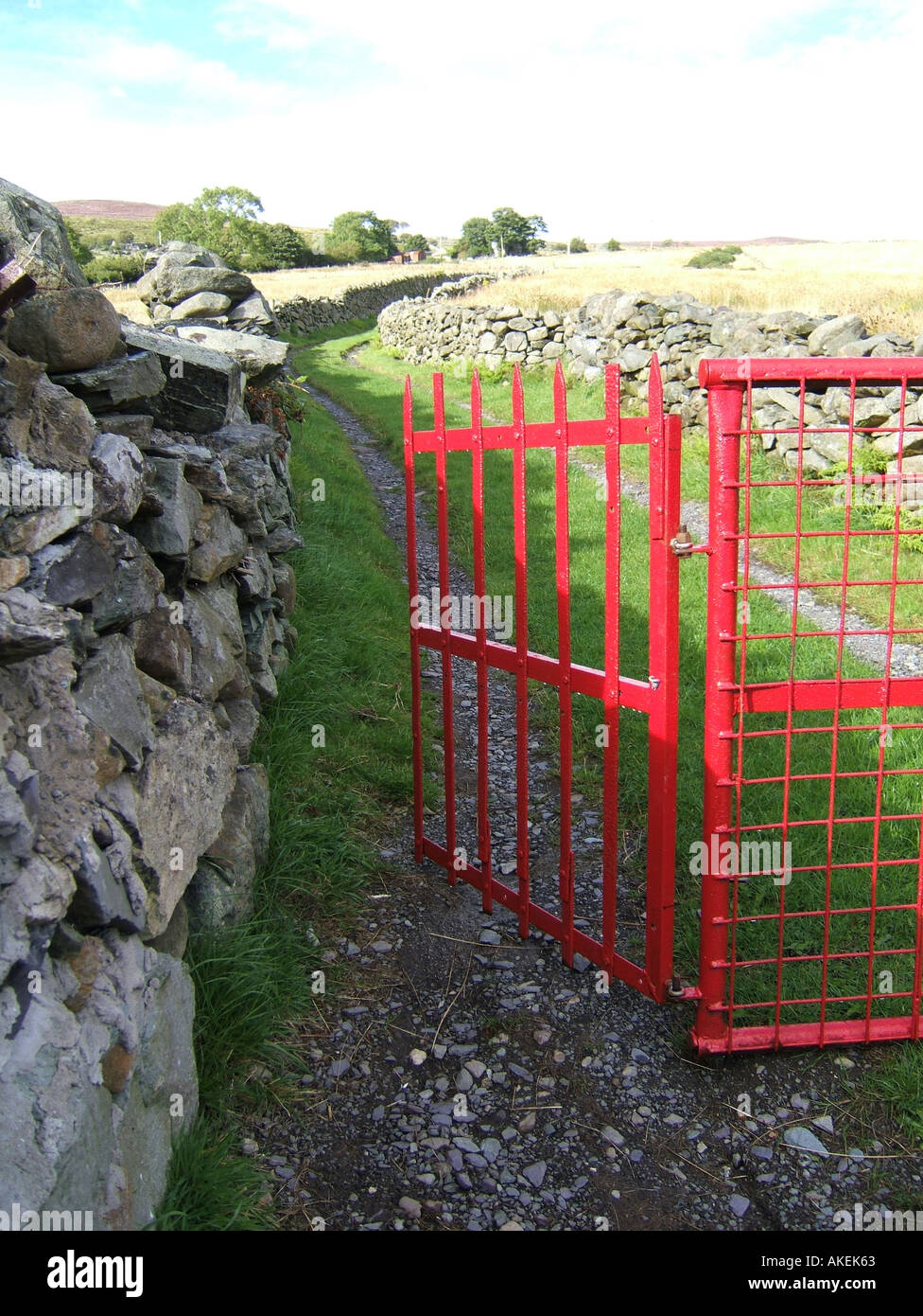 red gate on footpath in snowdonia wales Stock Photo - Alamy