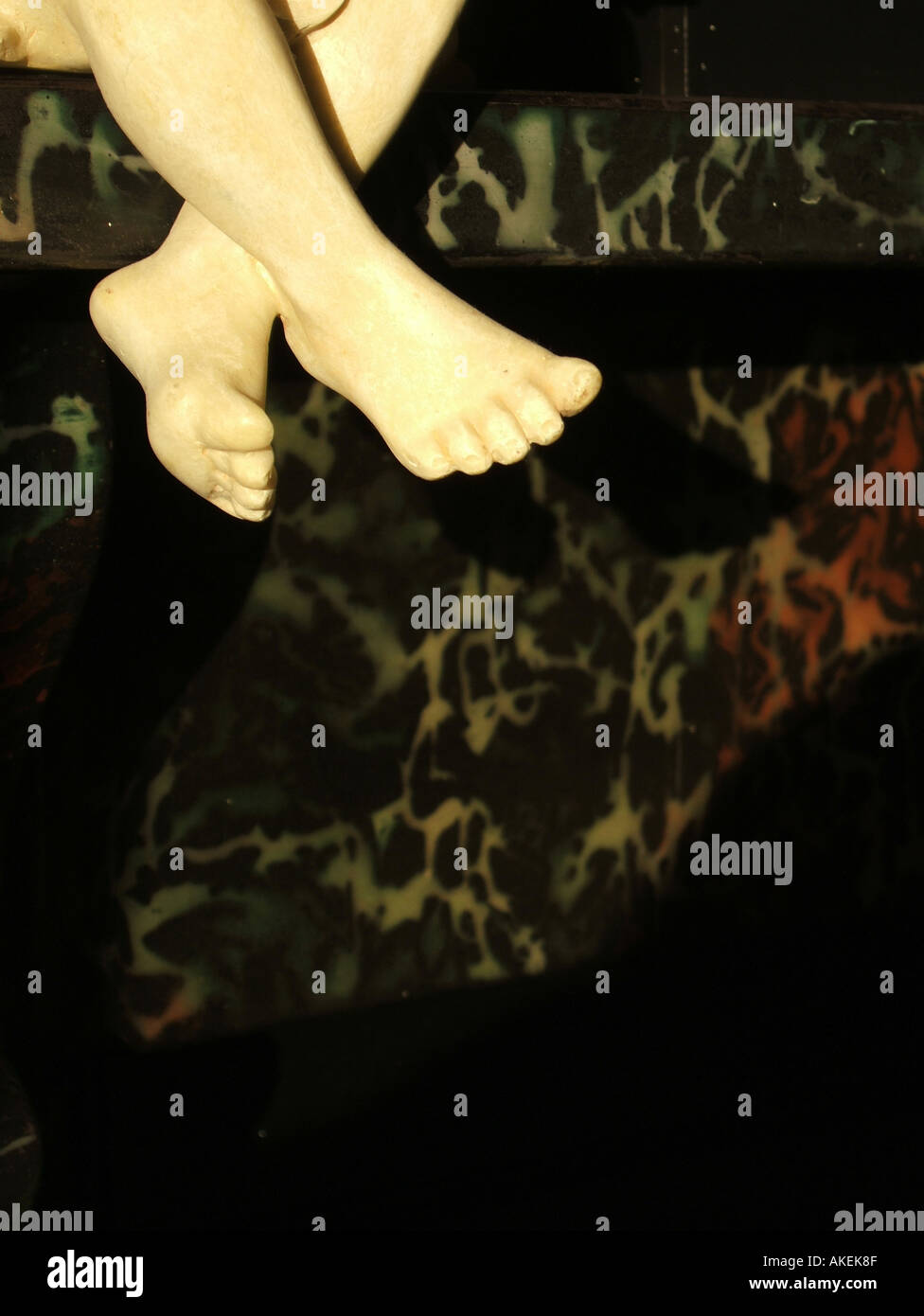 marble statue sitting crossed legs Stock Photo - Alamy