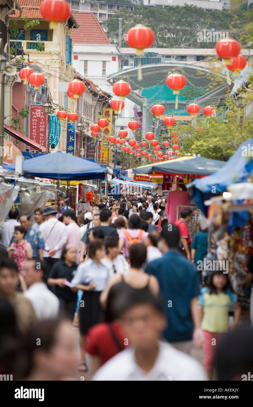 Crowd walking in a street market in a city, Chinatown, Singapore Stock ...