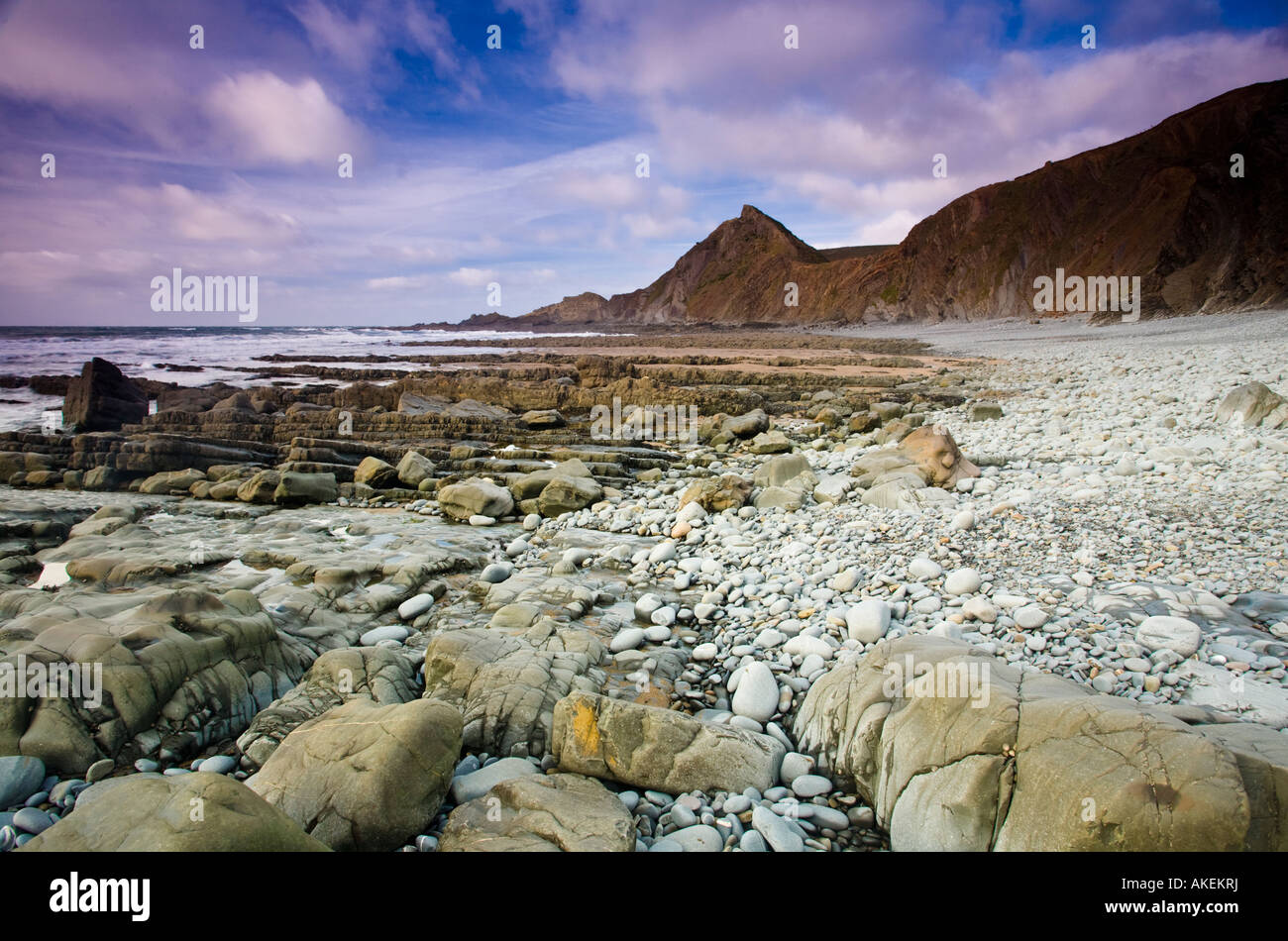 Rocks and pebbles on the beach at Spekes Mill Mouth Devon UK Stock ...