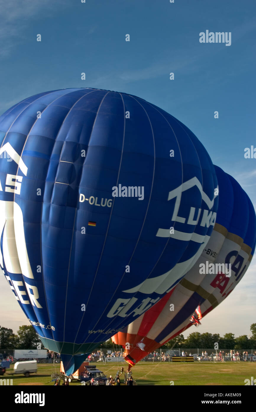 2 Blue balloons ready for flight Stock Photo - Alamy