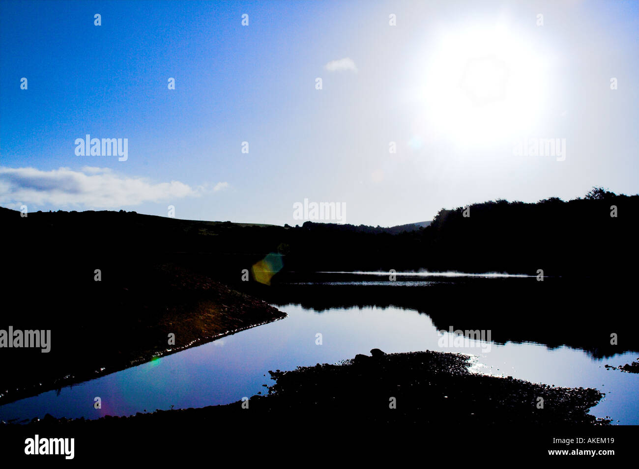 Morning Sun Over Water Stock Photo - Alamy