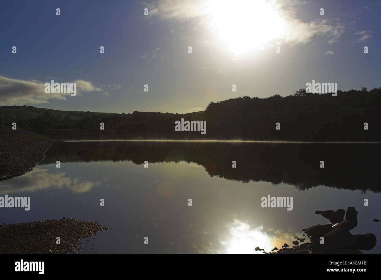 Sun Reflected in Water Stock Photo - Alamy
