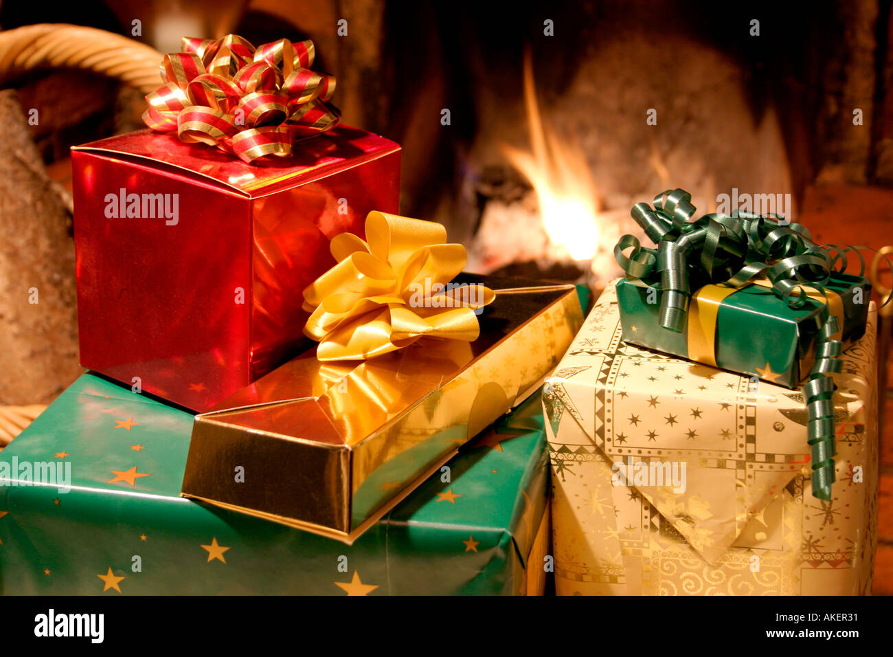 Christmas presents infront of open fire Stock Photo - Alamy